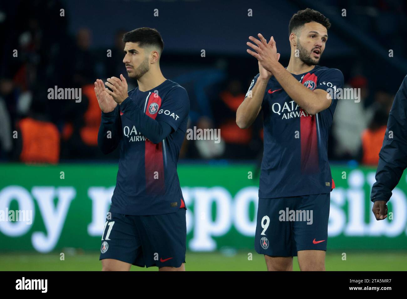 Paris, France. 29th Nov, 2023. Marco Asensio, Goncalo Ramos of PSG salute the supporters ...