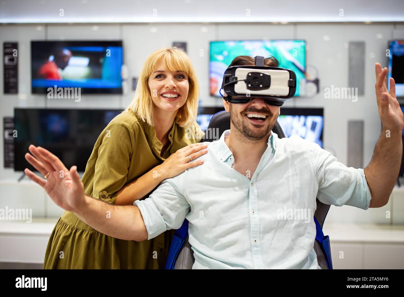 Group of people using virtual reality headset at exhibition, show. VR ...