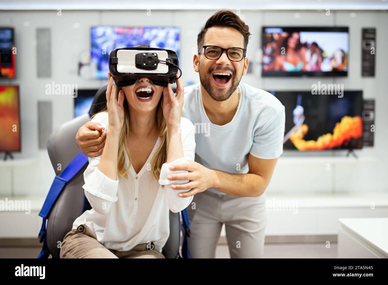 Group of people using virtual reality headset at exhibition, show. VR ...