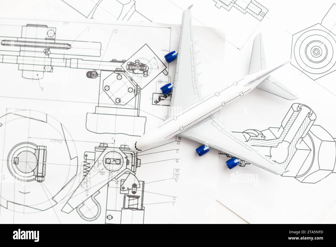 Miniature model airplane on a flight sectional map with focus on the ...