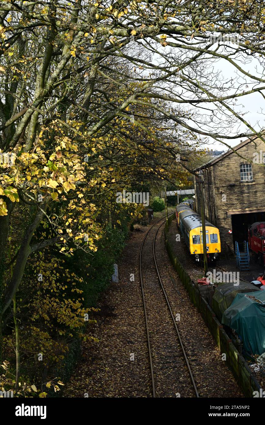 Diesel train at the engine shed in Autumn leavesHaworth Railway Station ...