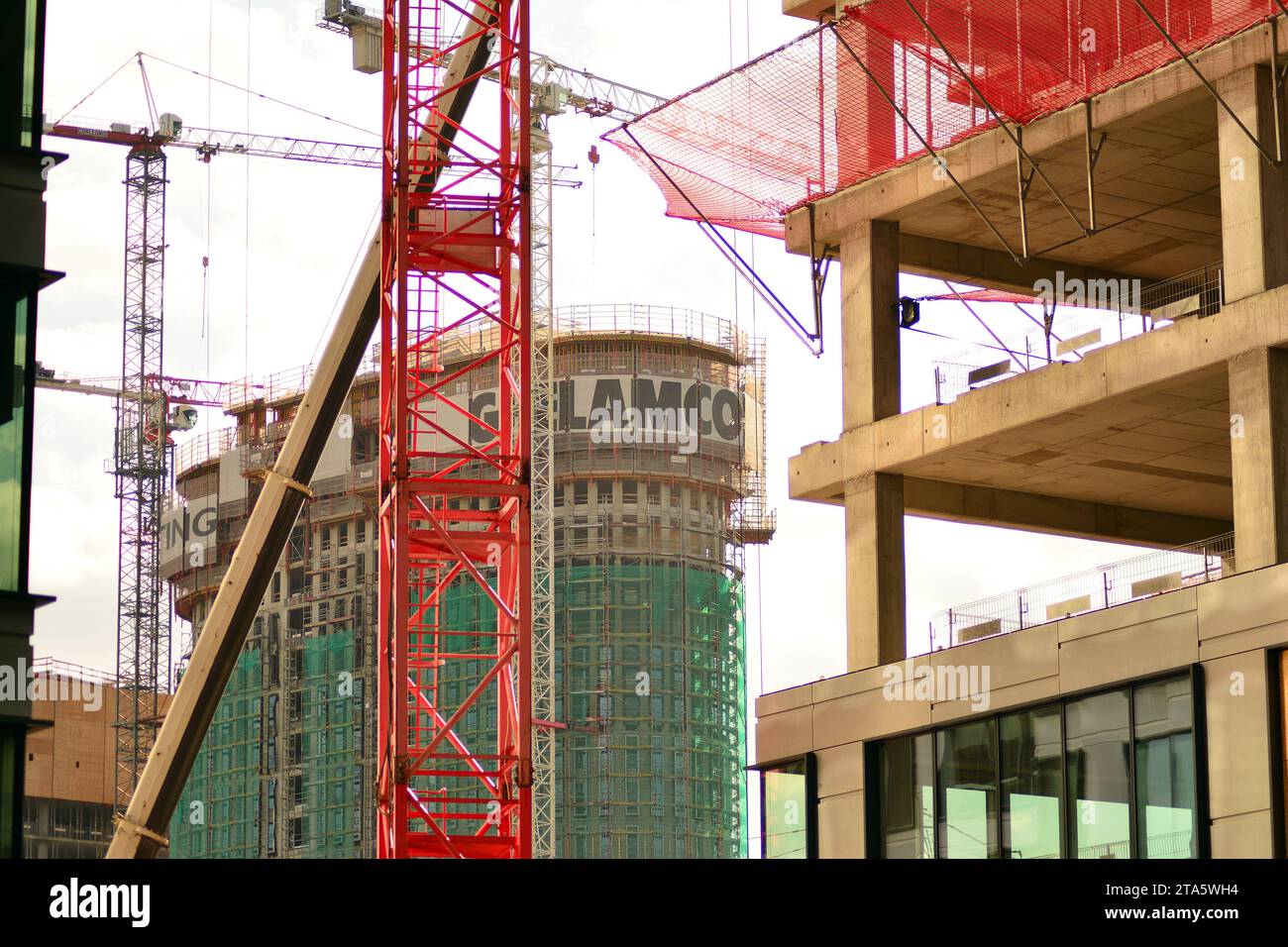 High rise building under construction. Installation of glass facade ...