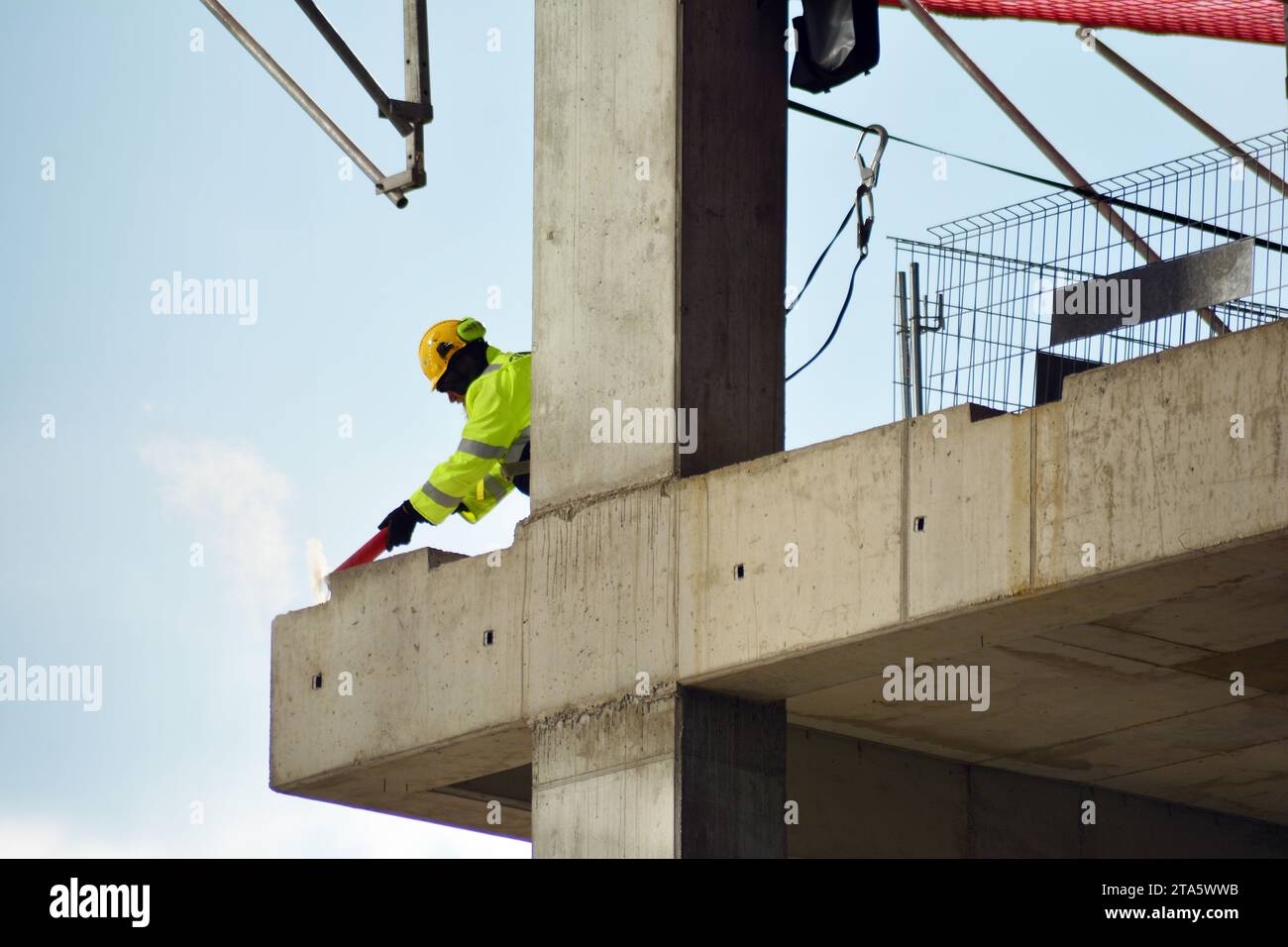 High rise building under construction. Installation of glass facade ...