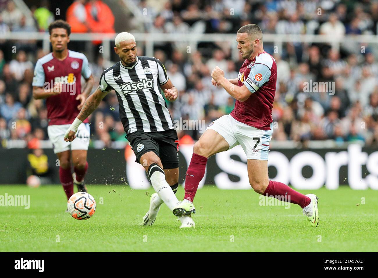 Joelinton Of Newcastle Fouls Callum Wilson Of Newcastle Newcastle