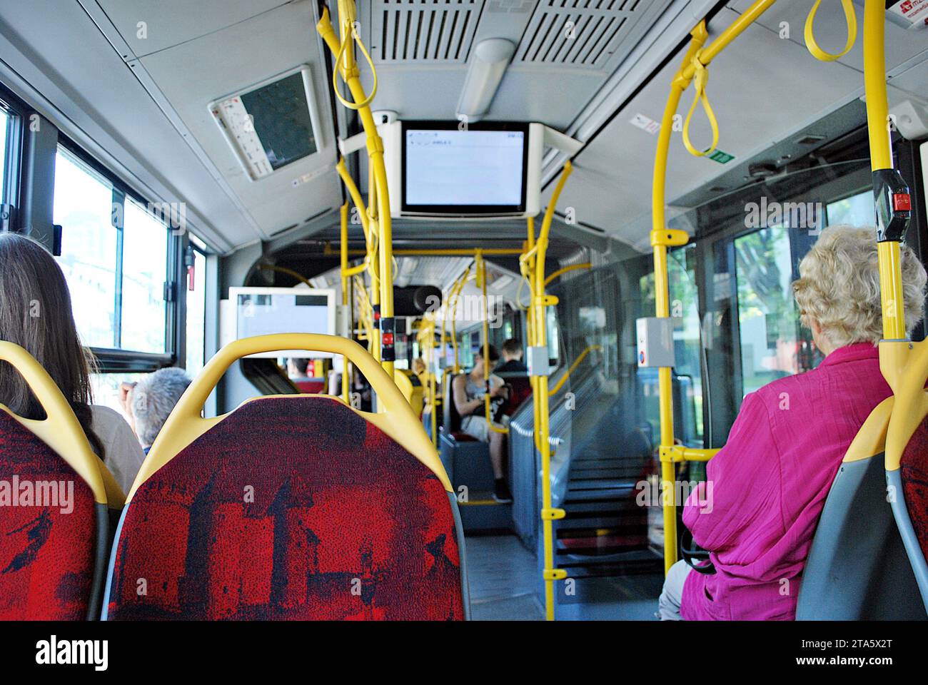 Interior of empty modern european city bus Stock Photo - Alamy