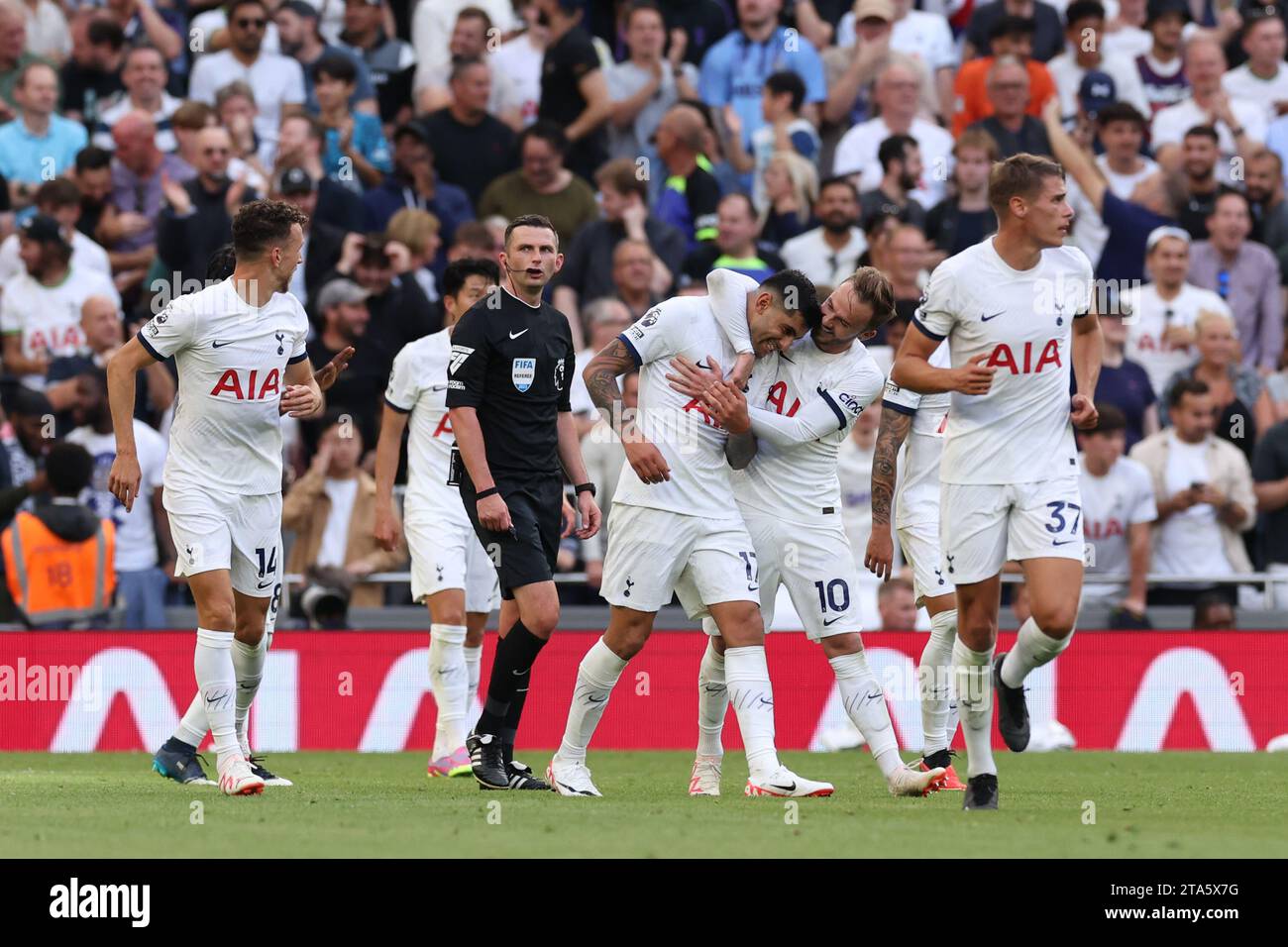 James Maddison of Tottenham Hotspur celebrates with Cristian Romero the ...