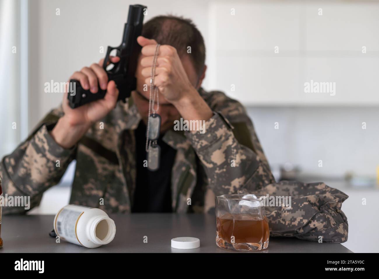 Threat of firearms. Muzzle of gun in man's hand is pointed at camera ...