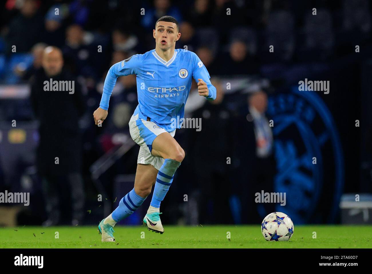 Phil Foden #47 of Manchester City runs with the ball during the UEFA Champions League Group G ...
