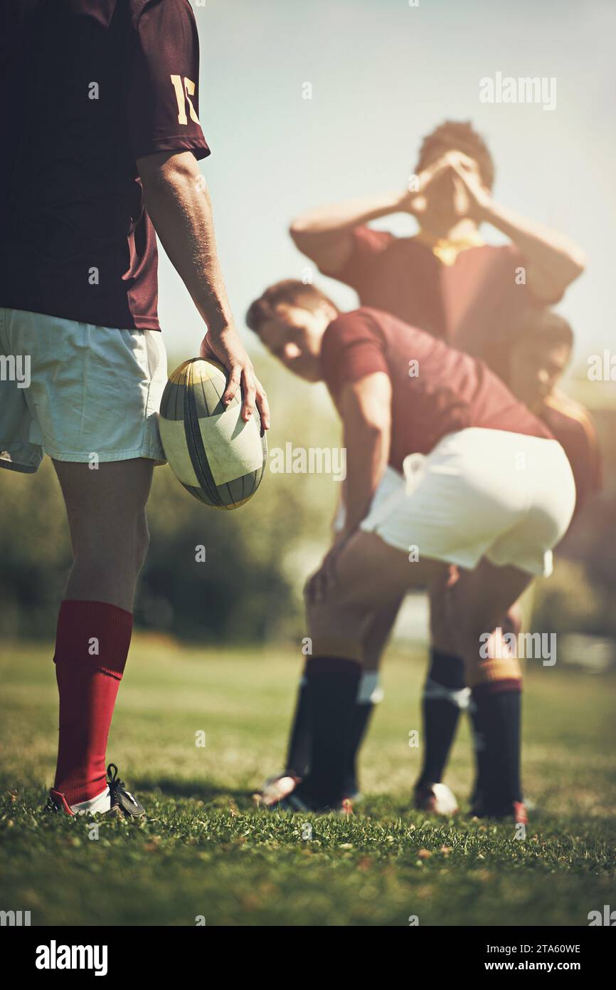 Action scrum huddle hi-res stock photography and images - Alamy
