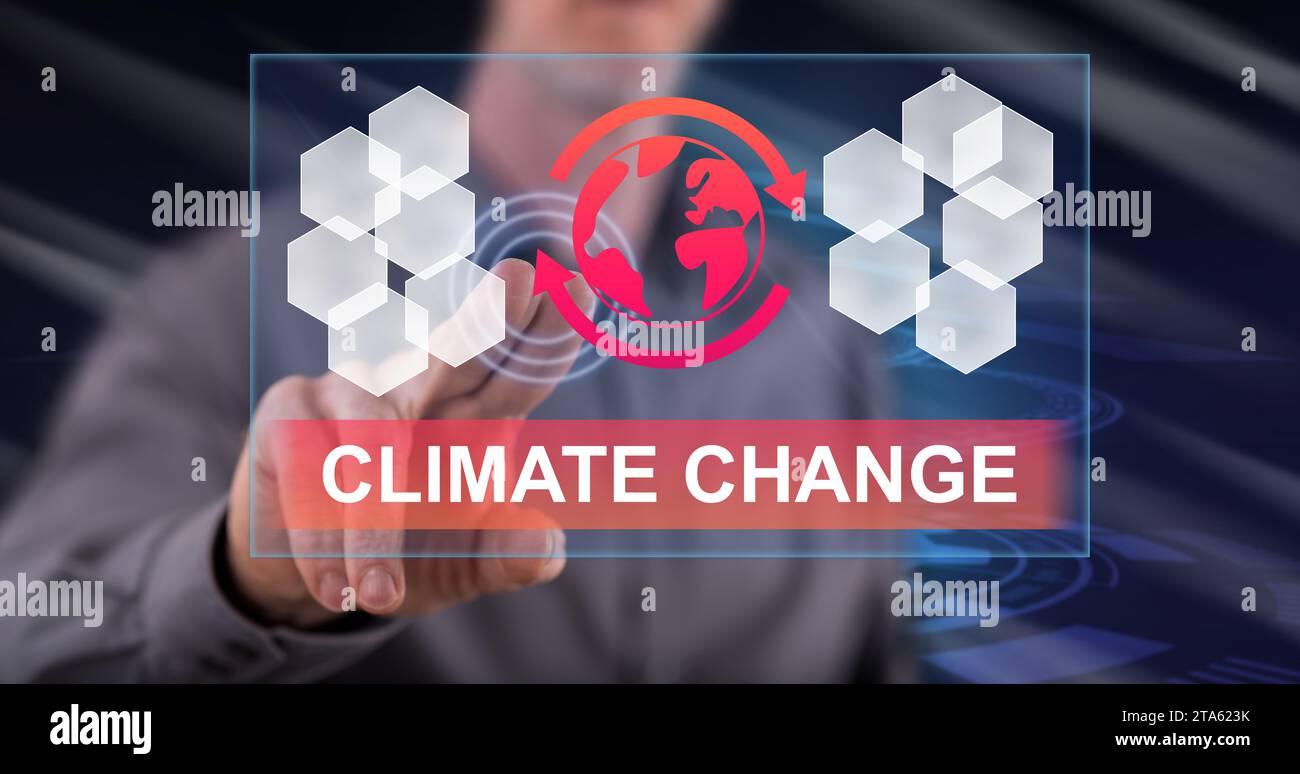 Man touching a climate change concept on a touch screen with his finger ...