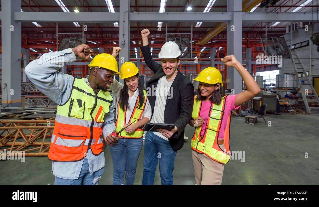 Celebrating Success. Hardhat construction worker raising their hand ...