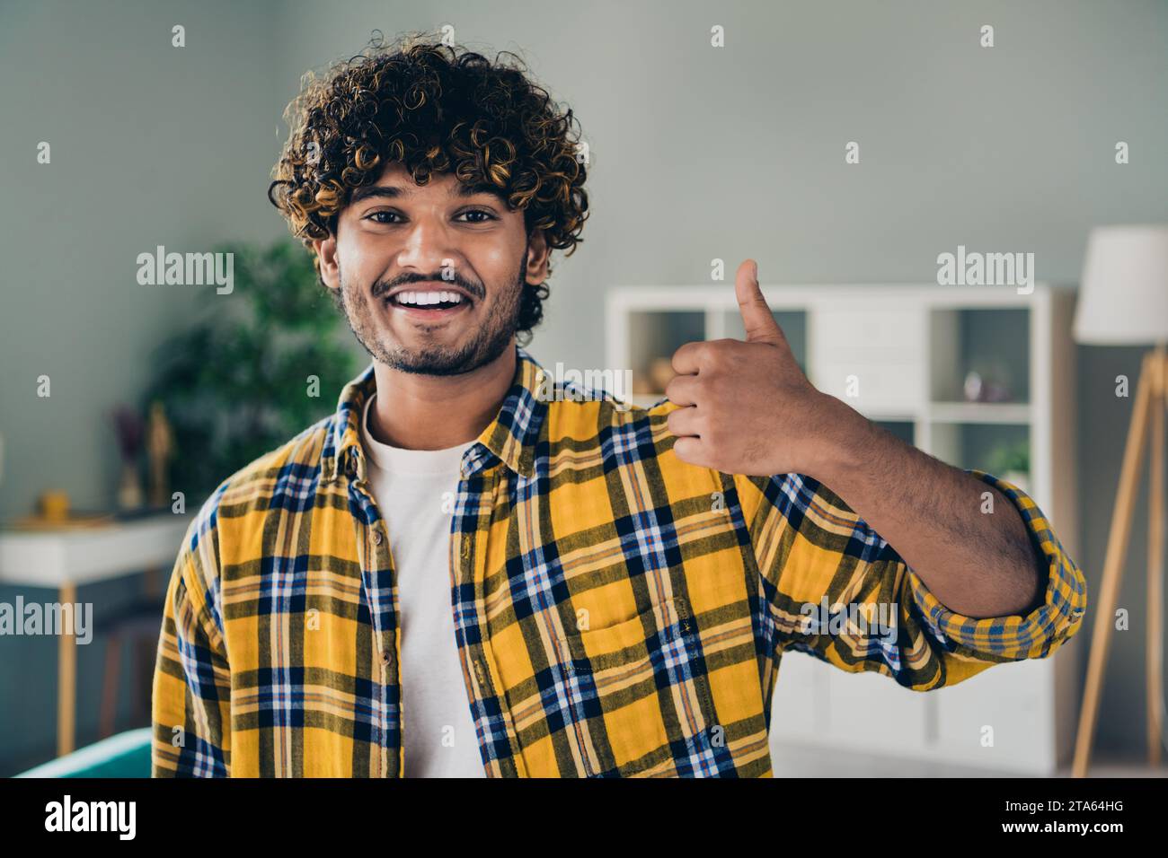 Photo of cheerful nice person toothy smile hand finger demonstrate ...