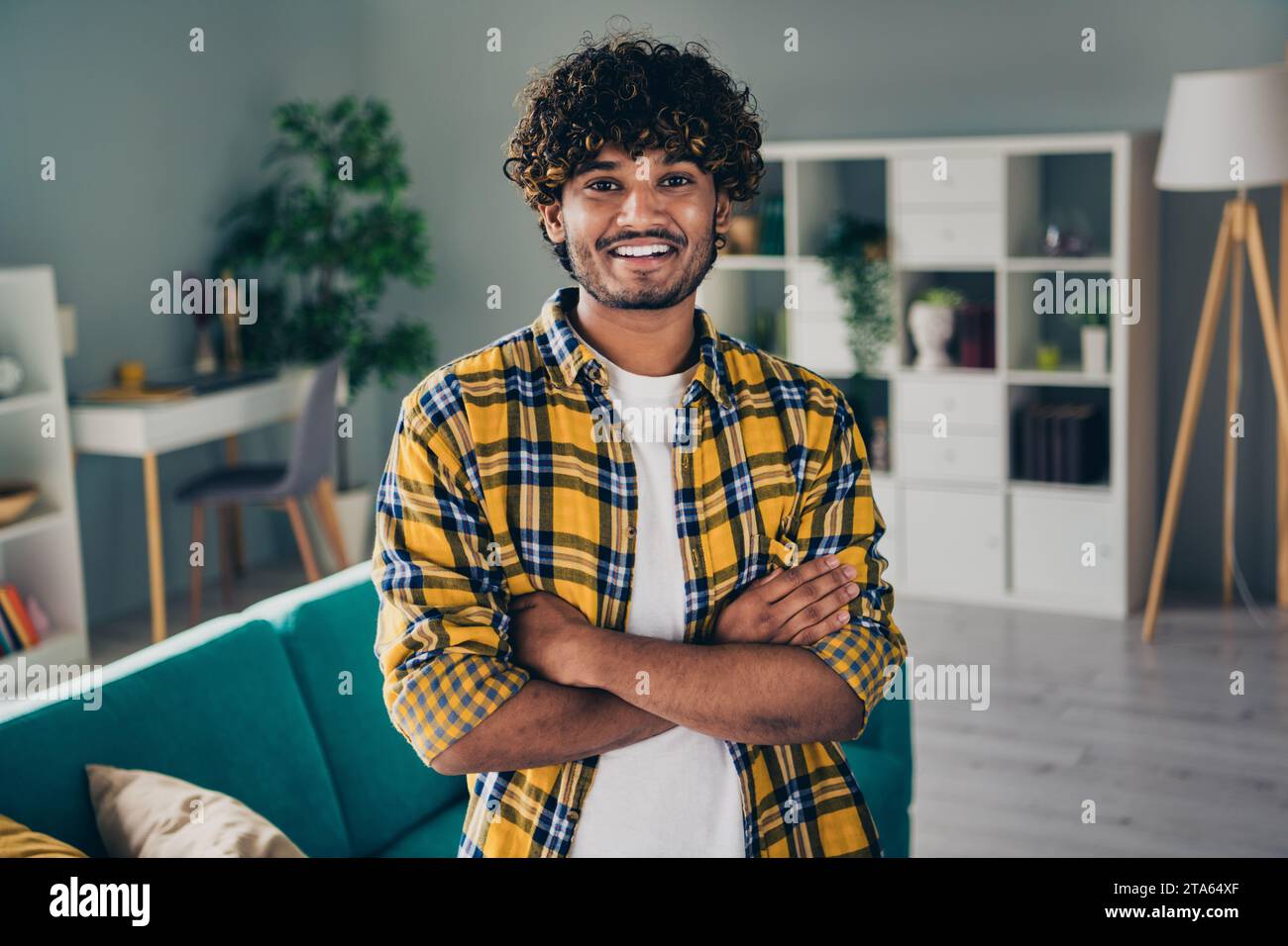 Photo of positive person folded hands toothy smile demonstrate modern ...