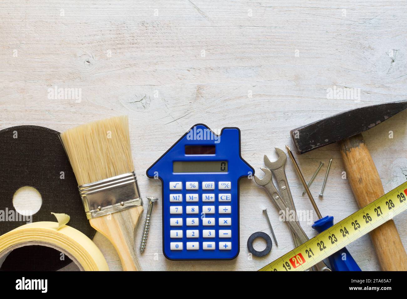 DIY tools and calculator on wooden background, home renovation and ...