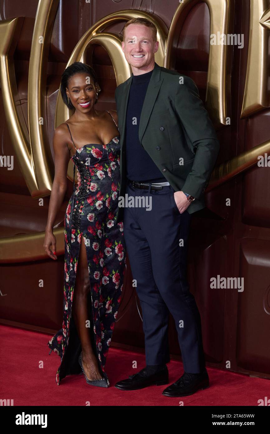 London, UK . 28 November, 2023 . Greg Rutherford (R) and Guest pictured ...