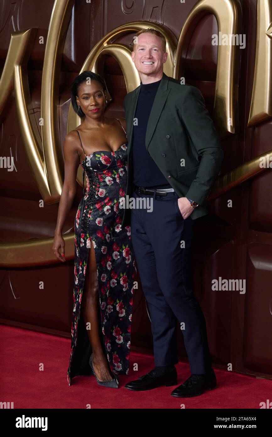 London, UK . 28 November, 2023 . Greg Rutherford (R) and Guest pictured ...