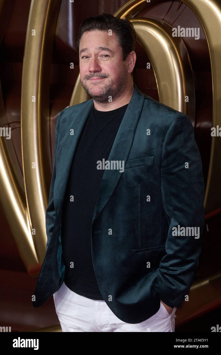 London, UK . 28 November, 2023 . Rufus Jones (R) and guest pictured at ...