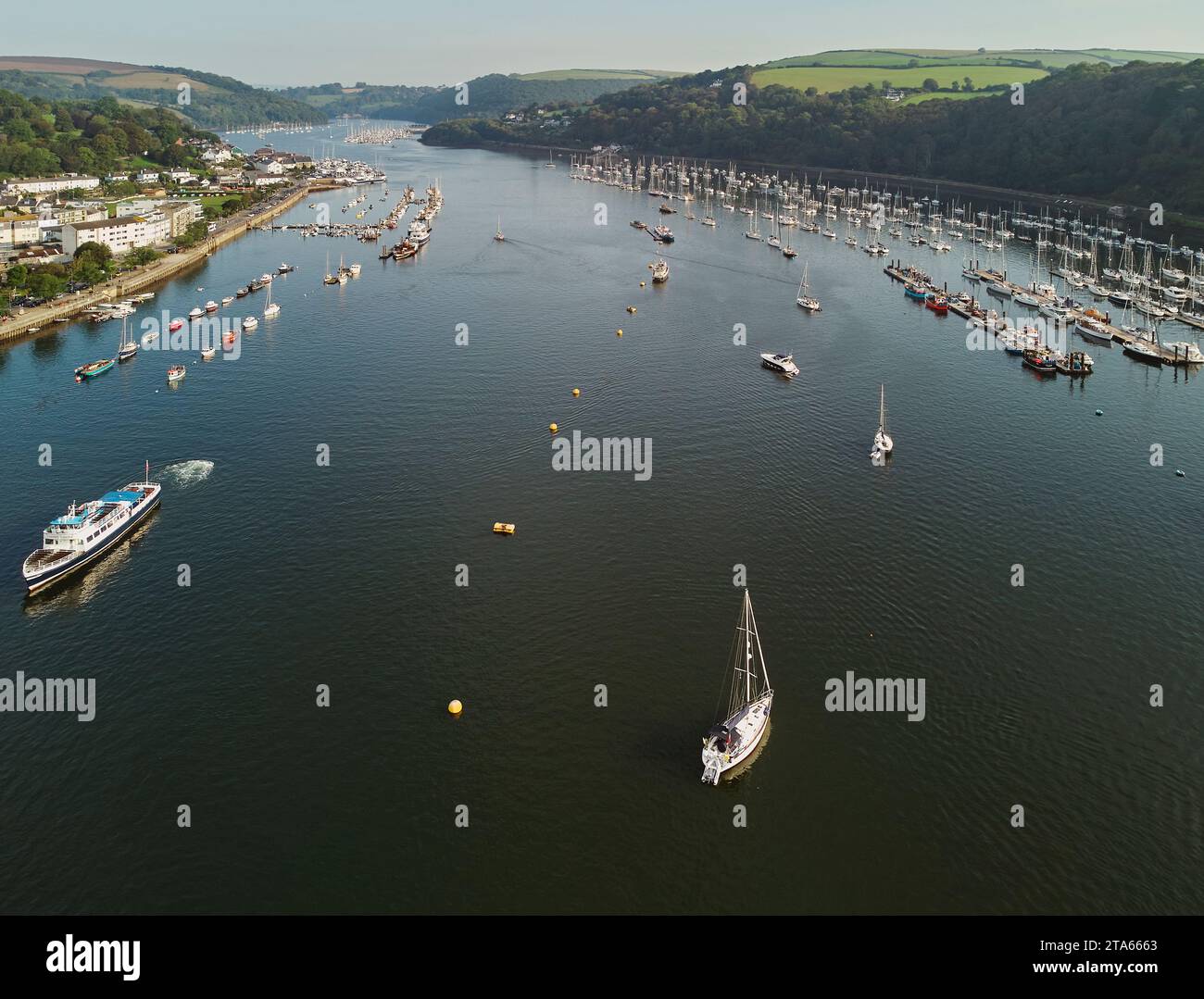 An aerial view of the estuary of the River Dart, with yachts, moorings ...