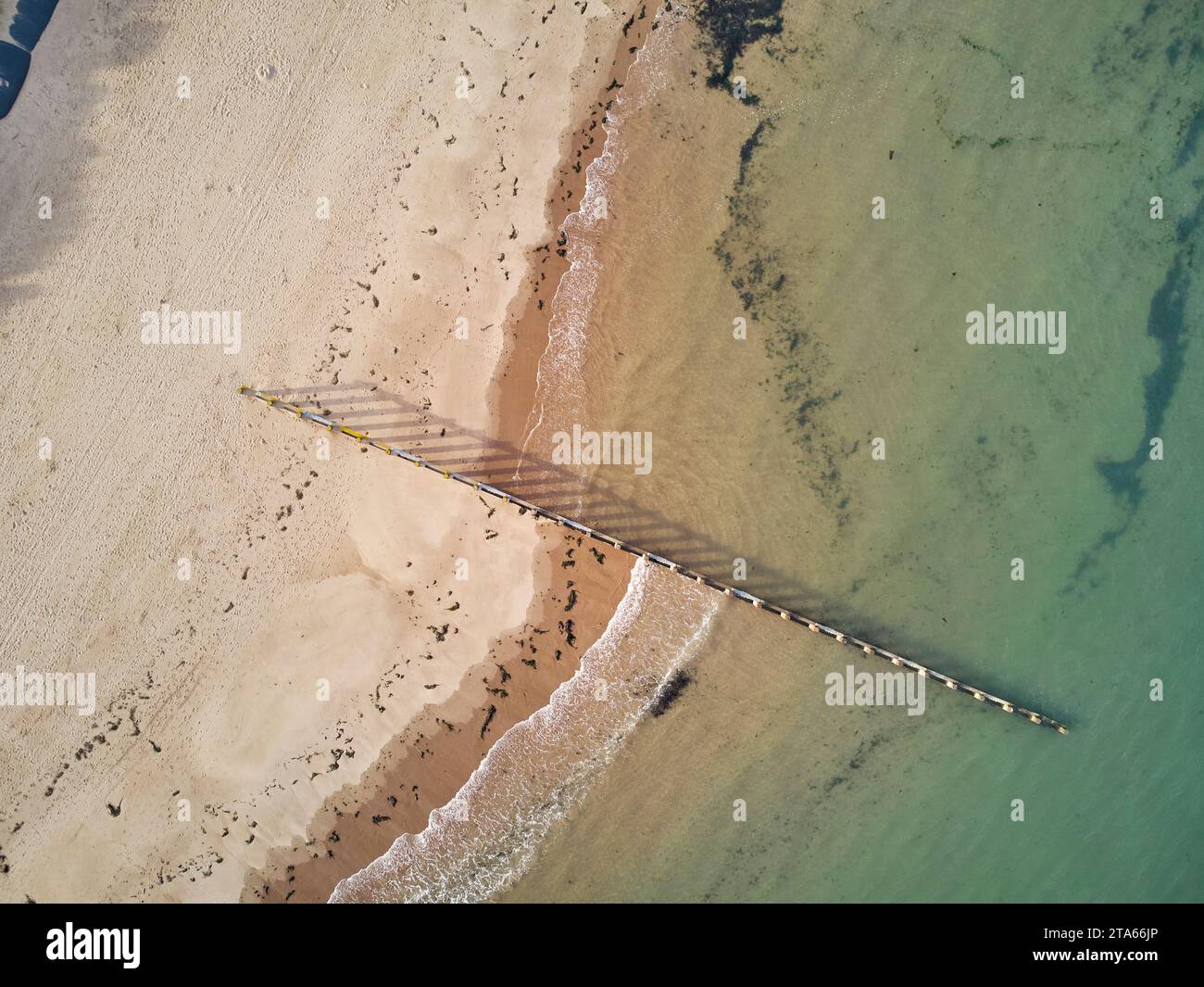 An aerial view of the beach and a groyne, at Dawlish Warren, near ...