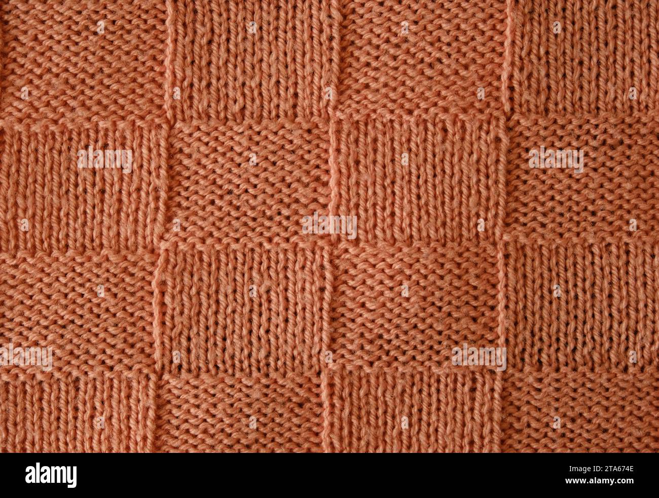 Unusual abstract knitted chess pattern background texture. Top view ...