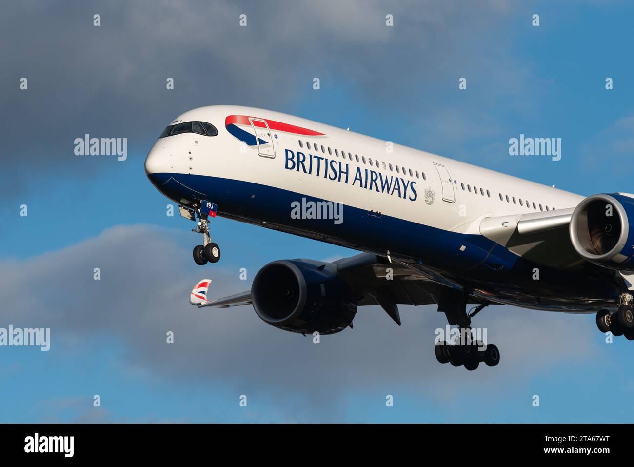 British Airways Airbus A350-1041 airliner jet plane G-XWBJ on finals to land at London Heathrow ...