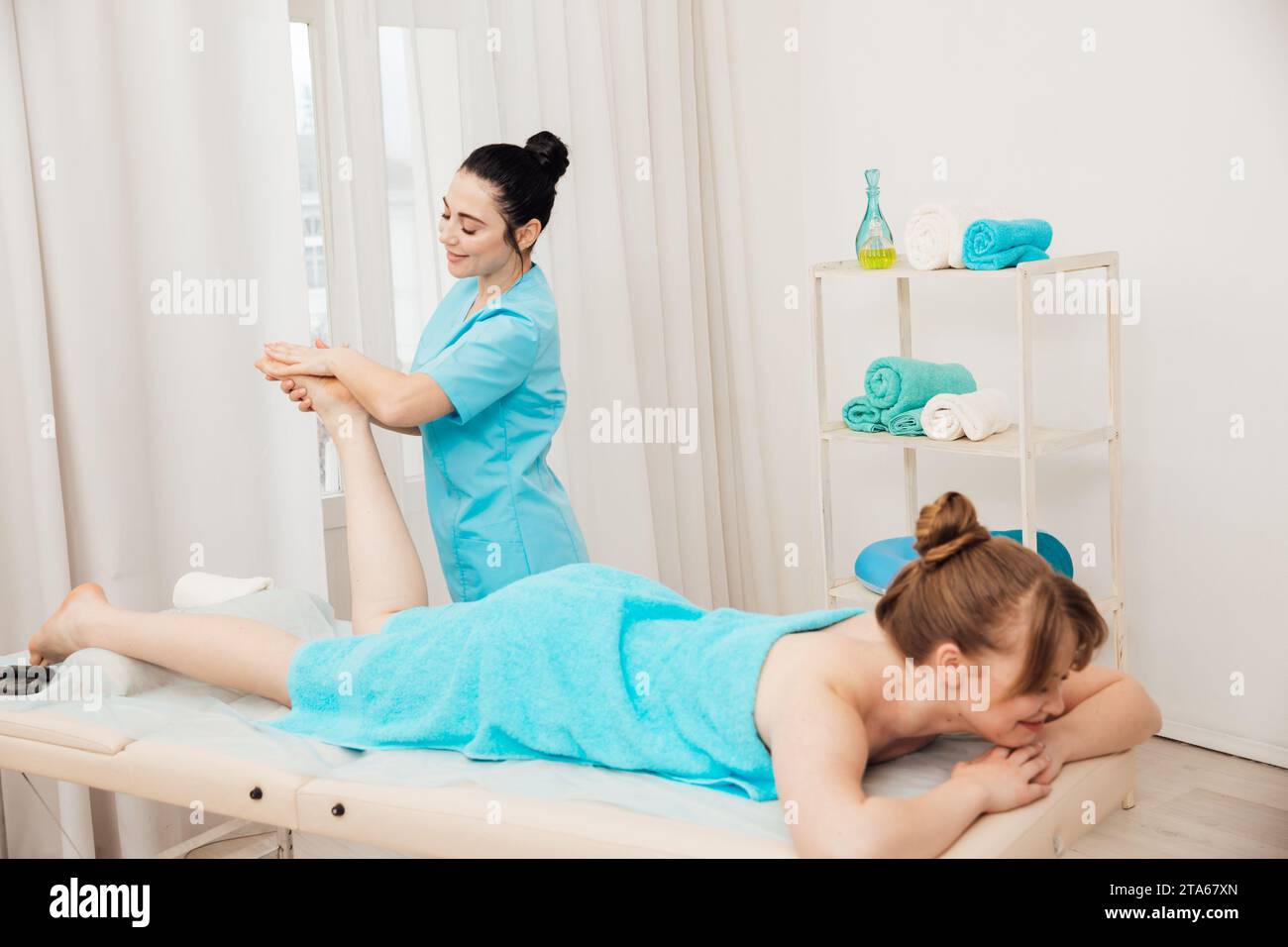 Girl doing massage in spa hi-res stock photography and images - Alamy