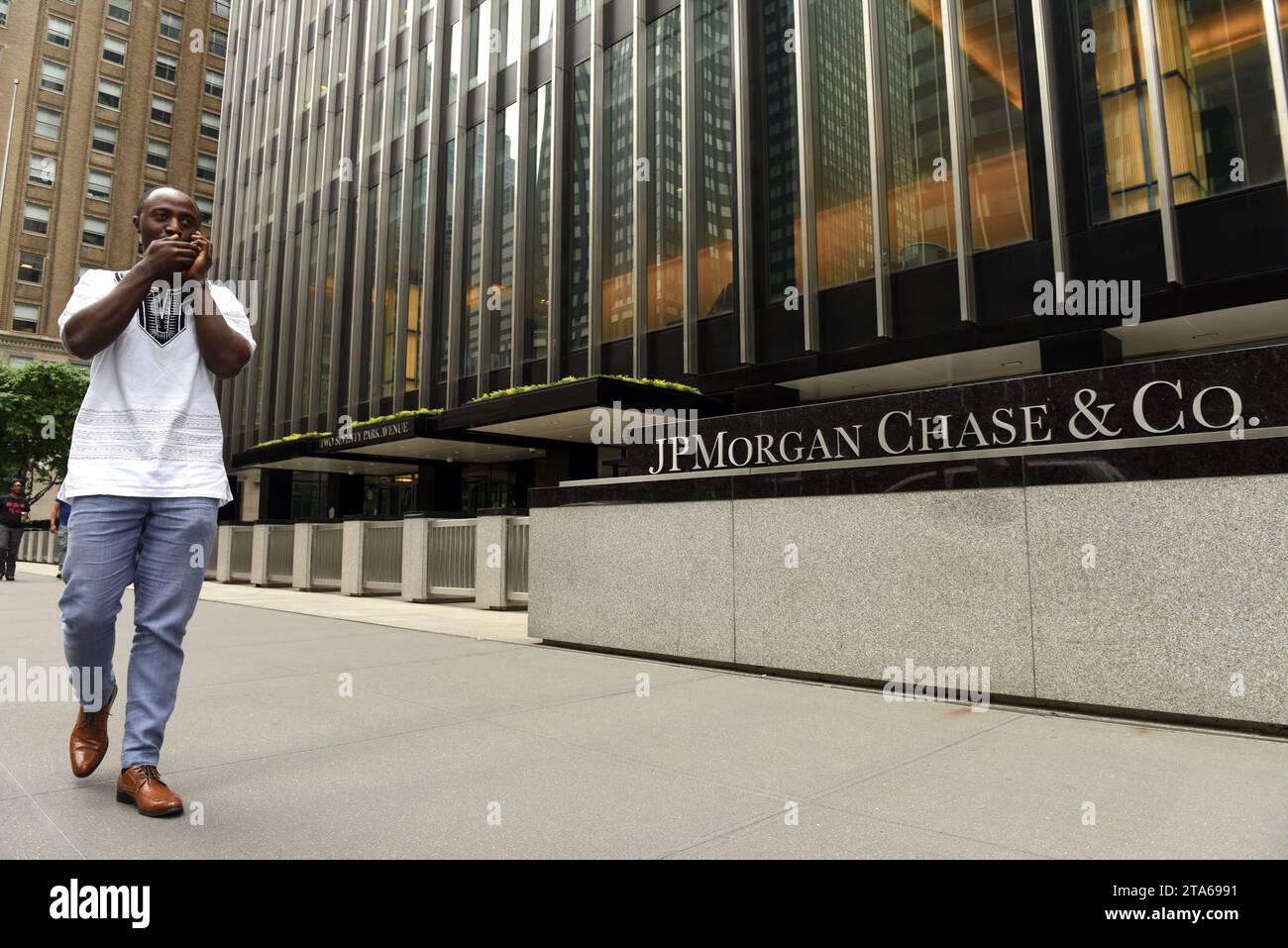 New York, USA - May 26, 2018: A man pass near JPMorgan Chase & Co ...