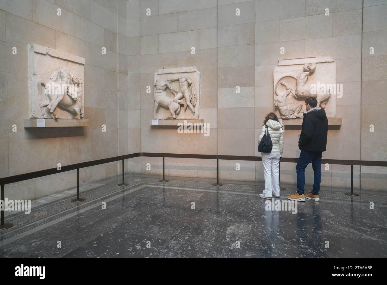London UK. 29 November 2023. Visitors at the British Museum view the Elgin Marbles also known as ...