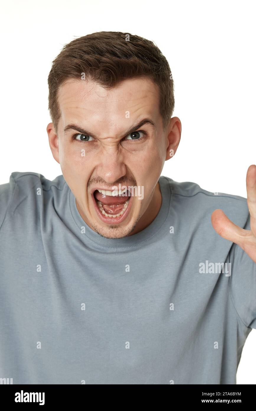 annoyed angry bearded man shouting on white studio background Stock ...