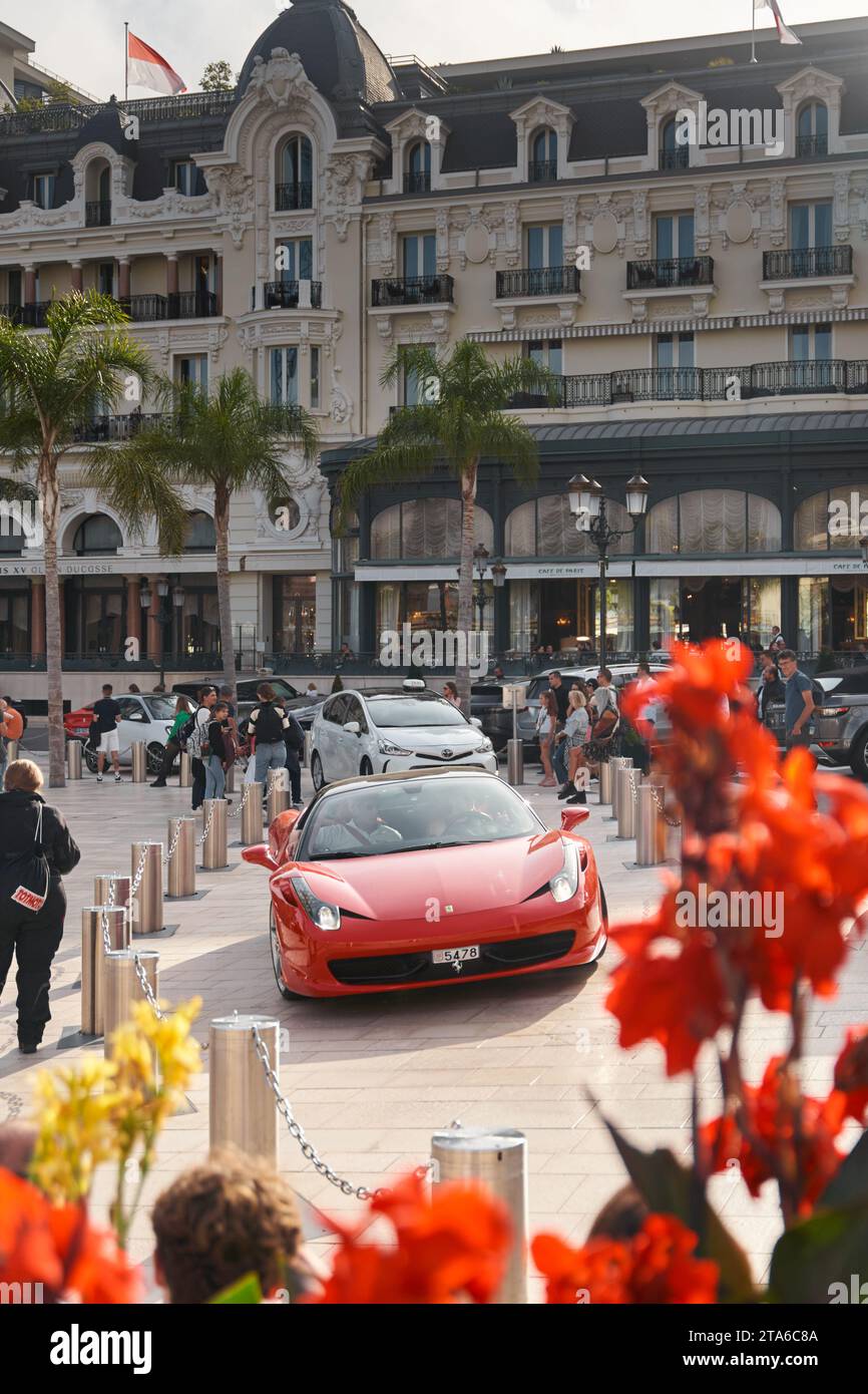 Monaco, Monte-Carlo, 22 October 2022: Square Casino Monte-Carlo at sunset, luxury cars, famous ...