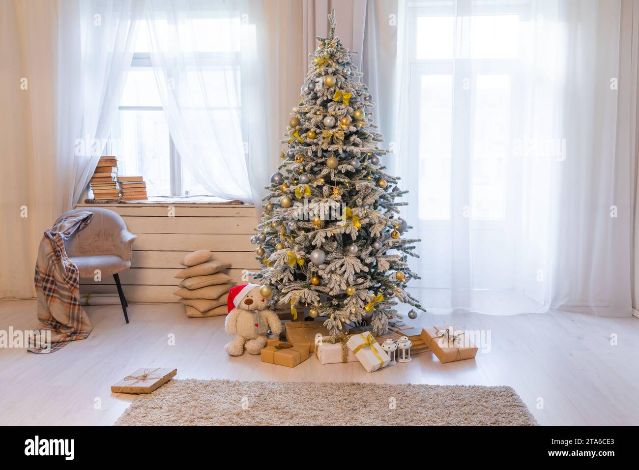 White christmas tree in interior without people Stock Photo - Alamy