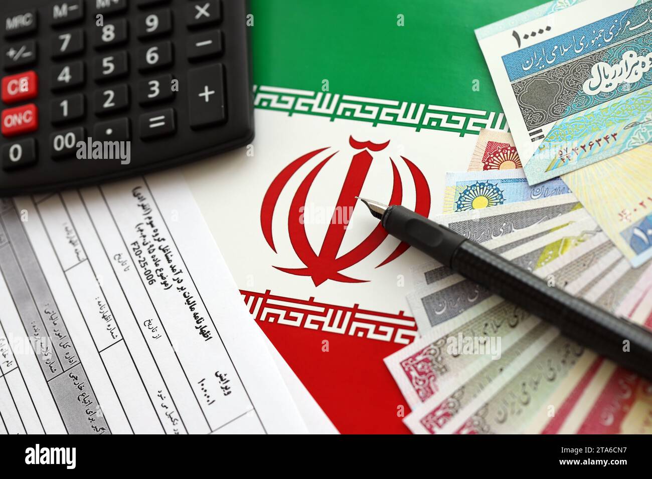 Iranian annual income tax return form F20-25-006 ready to fill on table ...
