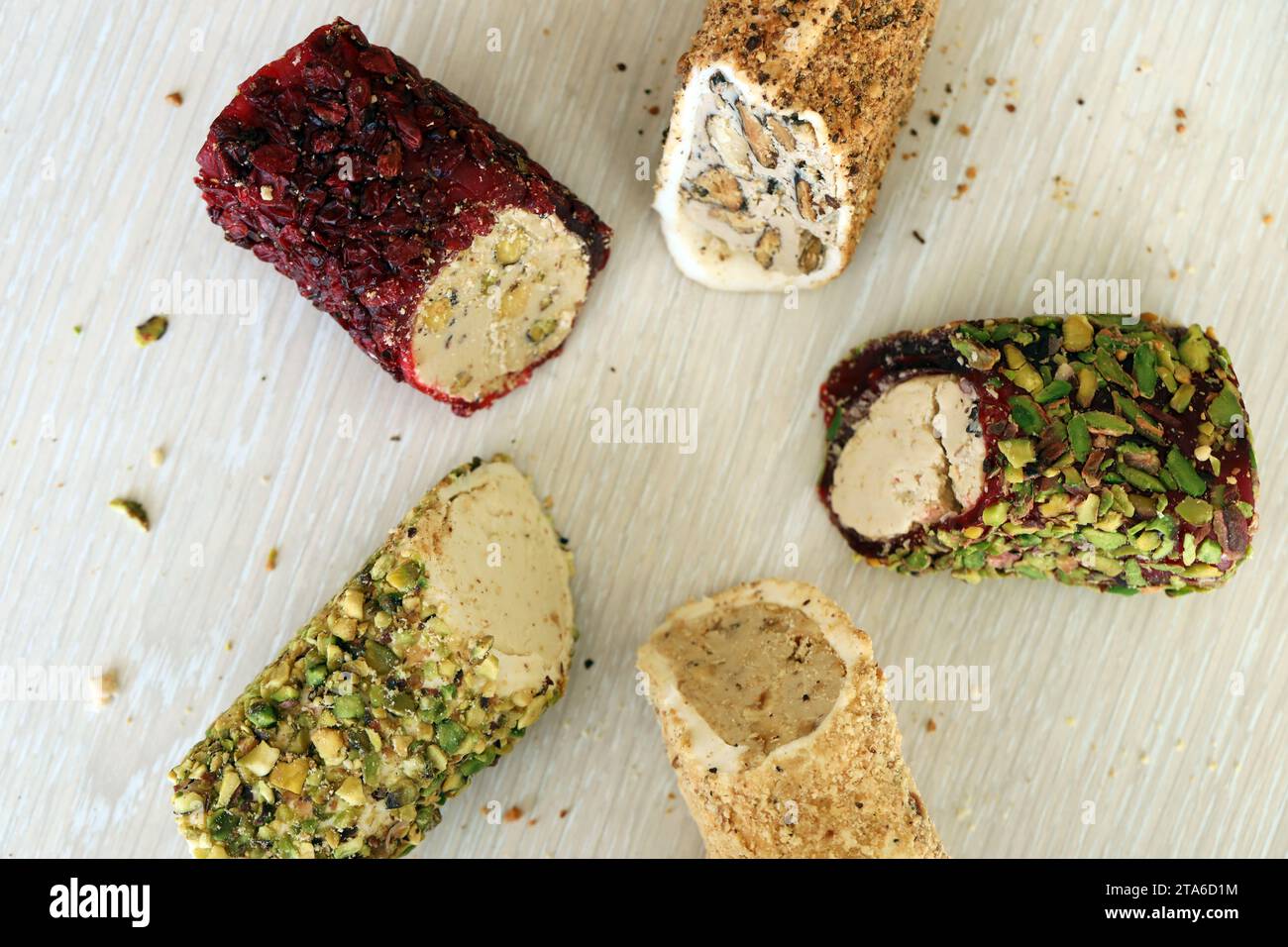 Rolls of turkish delight with different flavors and fillings close up ...
