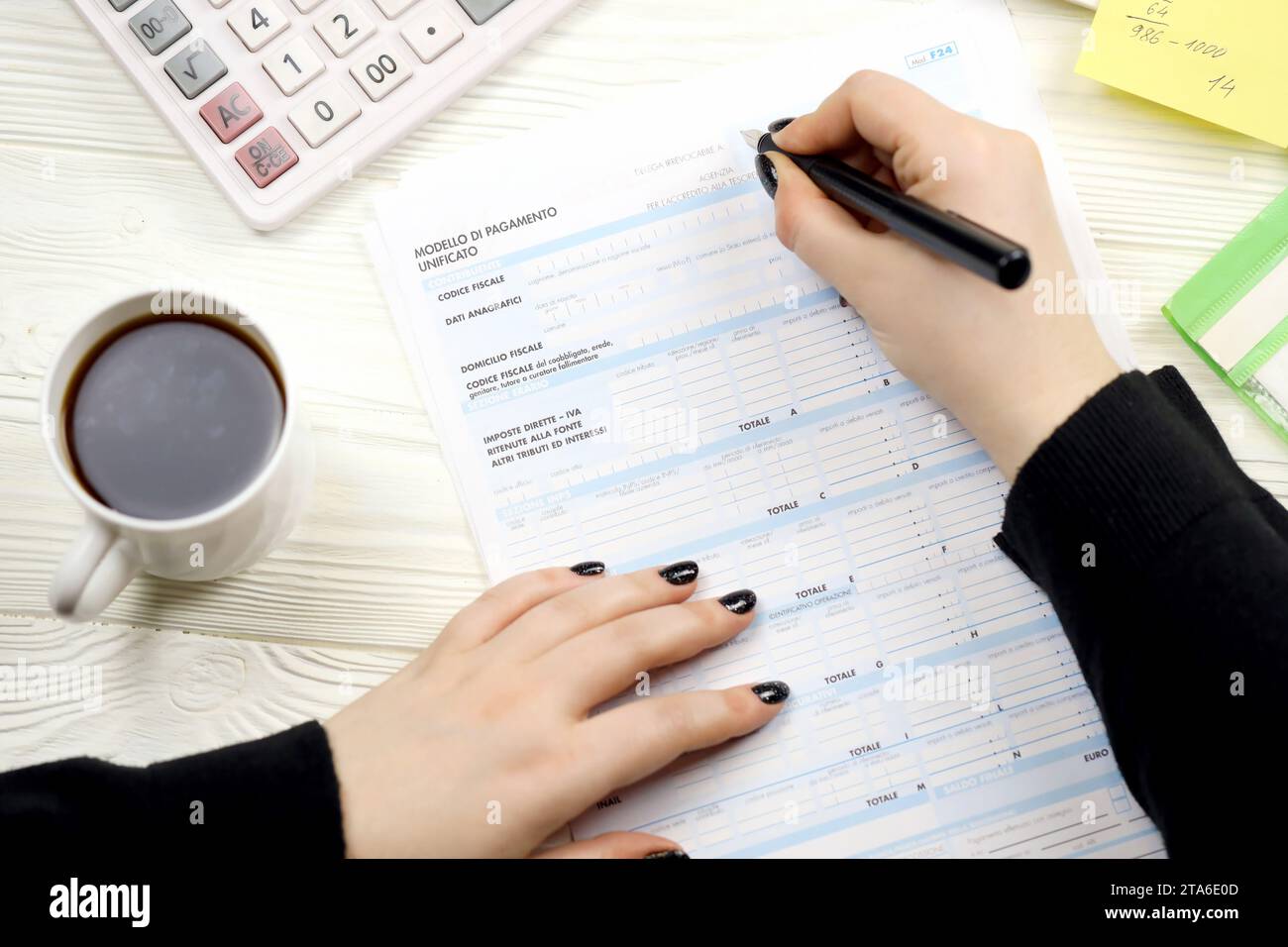 Accountant fill italian tax form F24 Unified payment model in end of ...