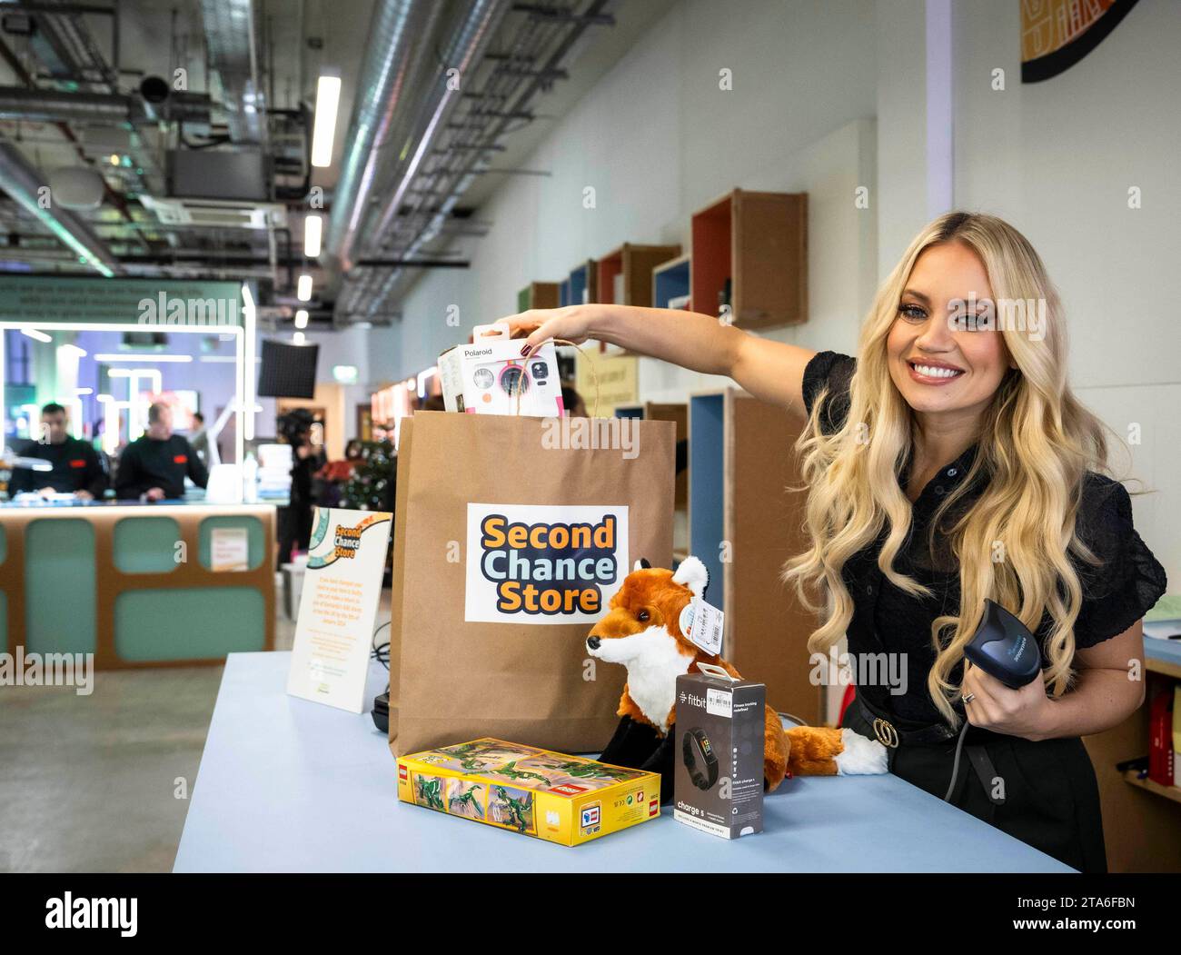 EDITORIAL USE ONLY Kimberly Wyatt surprises customers at the Amazon Second Chance Store, which ...