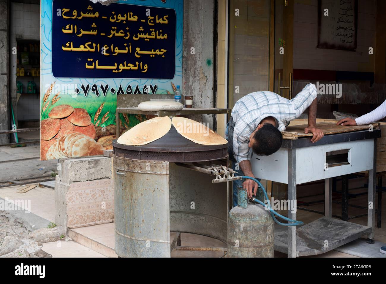 Al-Salt city, UNESCO World Heritage. Arabic bread making. Balqa ...