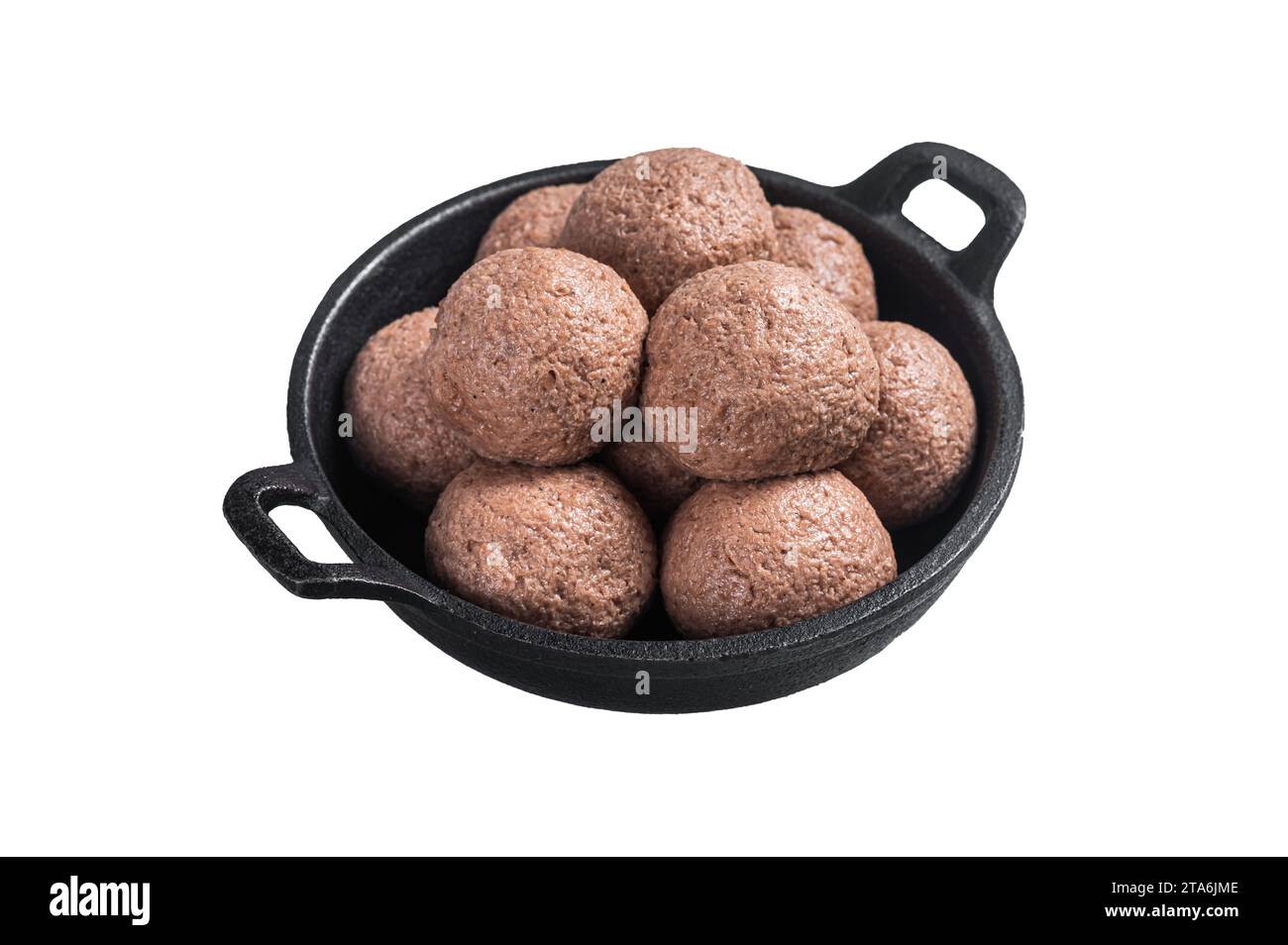 Raw Meatless Veggie meatballs in skillet. Isolated, white background ...