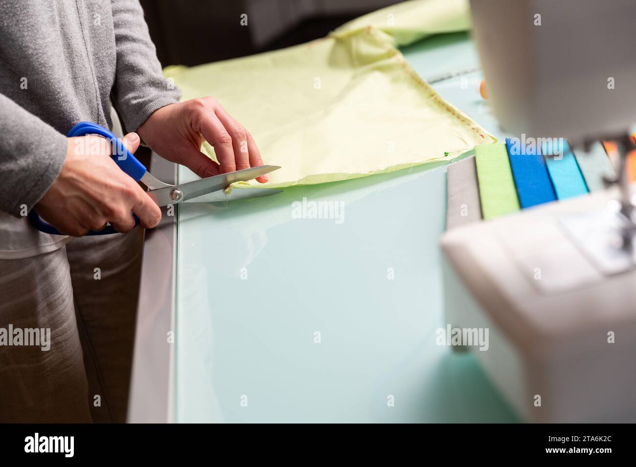 Woman tailor scissors cutting out hi-res stock photography and images ...