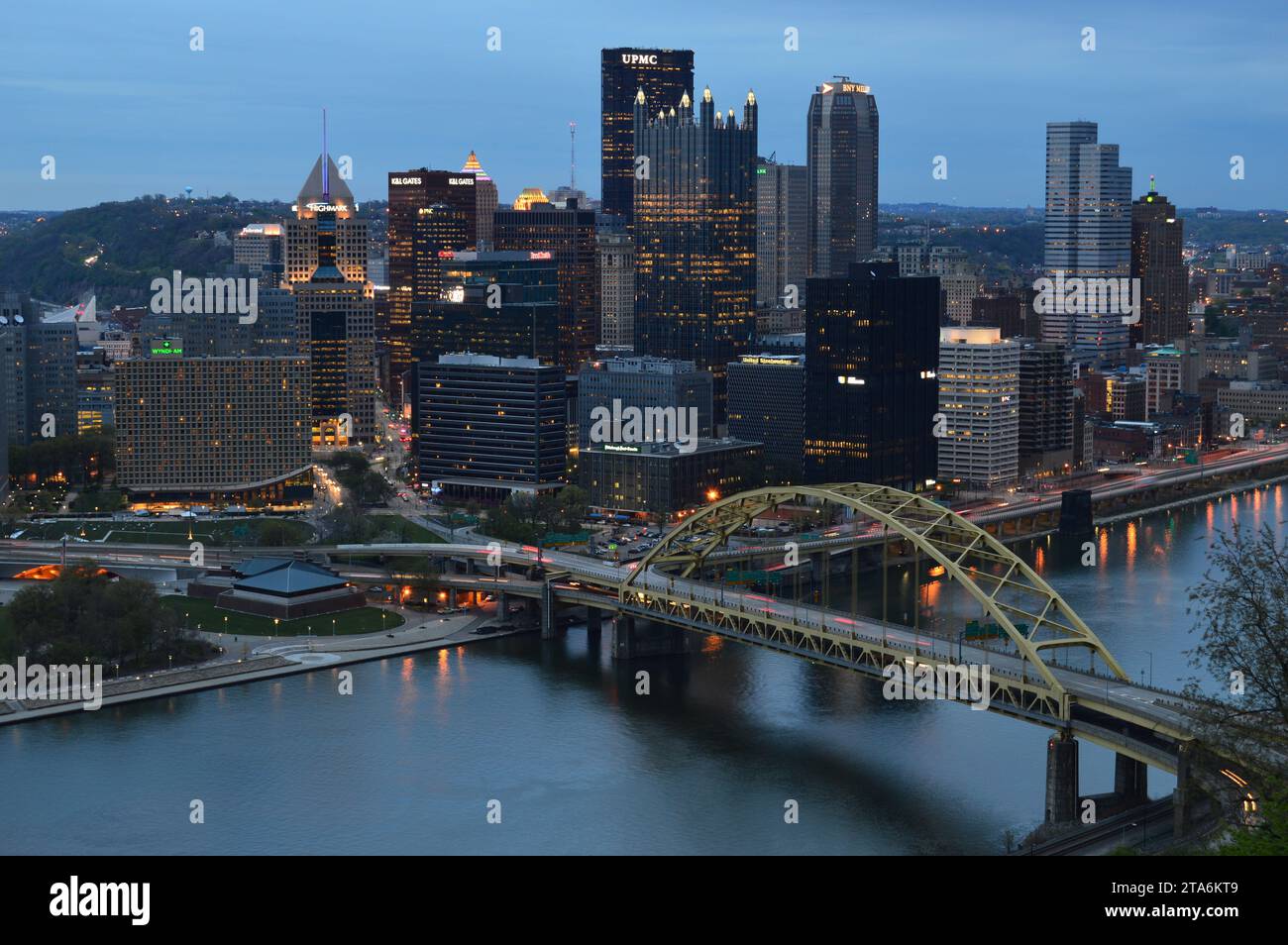 A bridge spans the river, enabling commuters to travel to and from ...