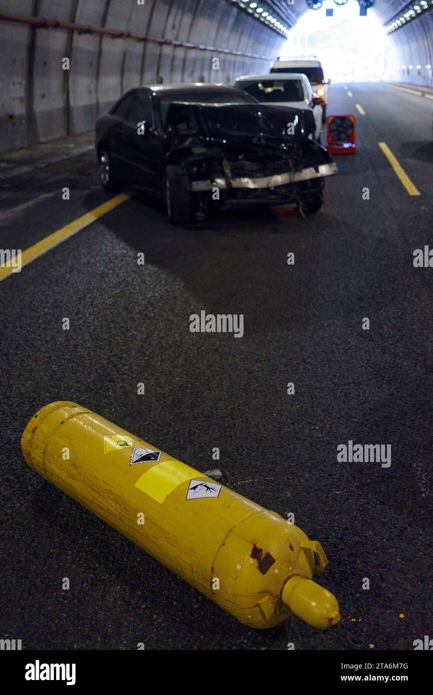 Traffic accident on the highway. Car collided with bottle of dangerous ...