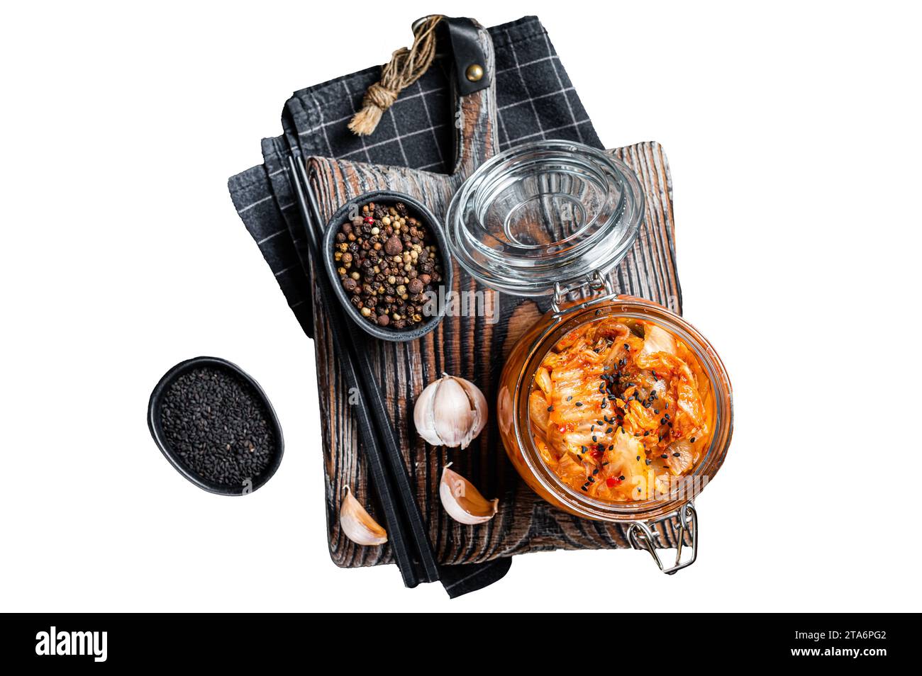 Homemade kimchi in a glass jar, traditional Korean cuisine. Isolated ...