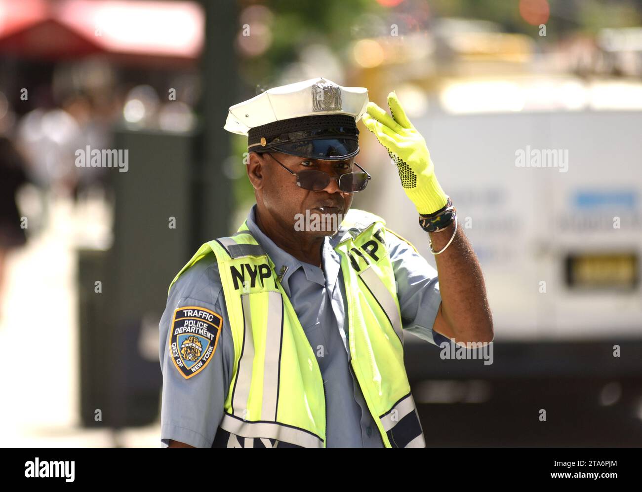 NEW YORK, USA - May 30, 2018: NYPD police officer performing his duties ...