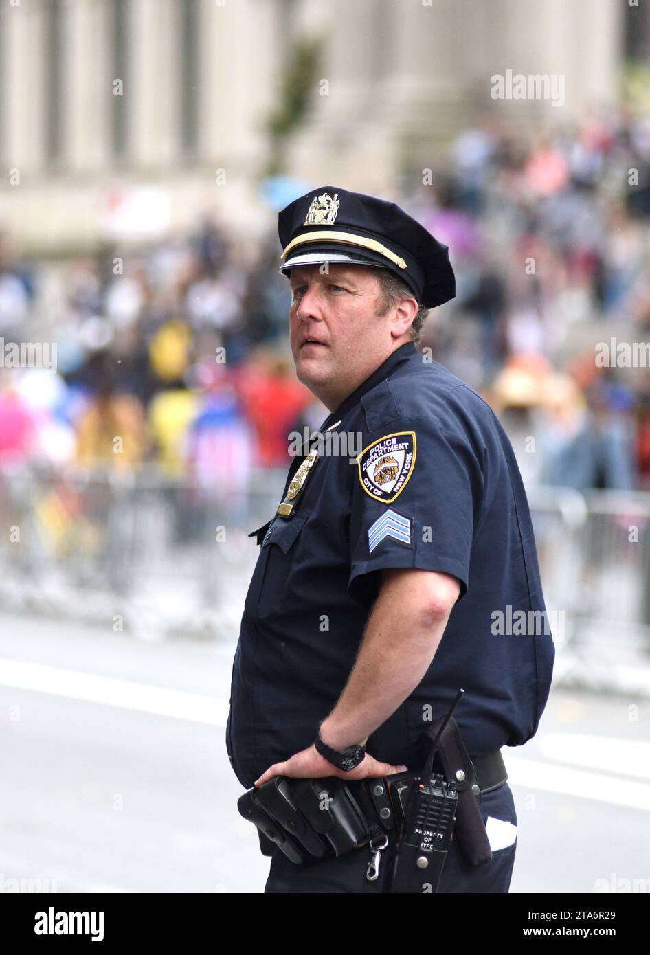 NEW YORK, USA - June 10, 2018: Police officer performing his duties on ...