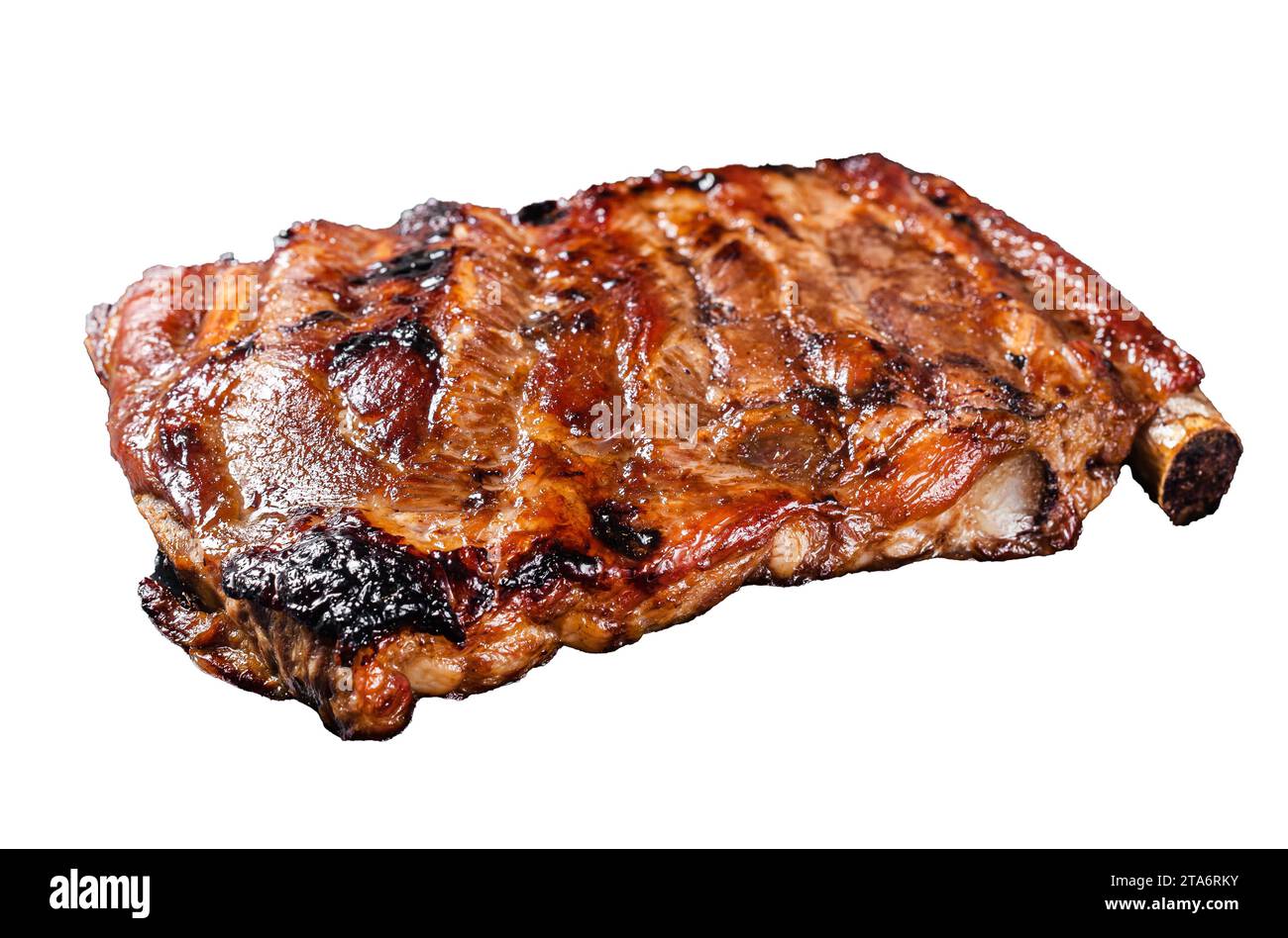 Full rack of BBQ grilled pork spare ribs on a marble board. Isolated ...
