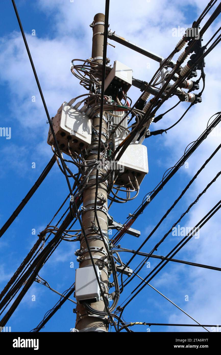 Electric grid in Japan. Concrete electric pole with wires Stock Photo ...