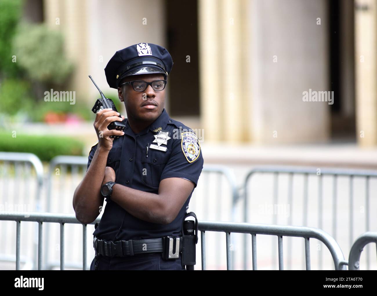 NEW YORK, USA - June 10, 2018: Police officer performing his duties on ...