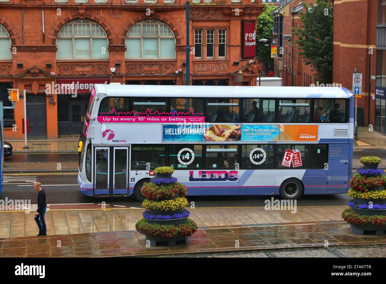 LEEDS, UK - JULY 11, 2016: People ride FirstLeeds double decker bus in ...