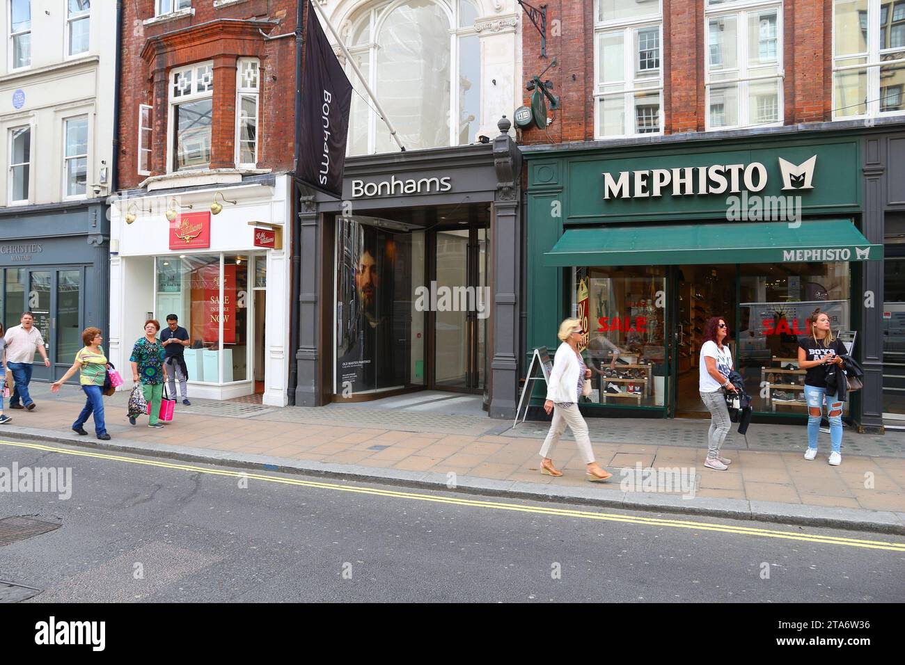 LONDON, UK - JULY 7, 2016: People shop at New Bond Street in London ...