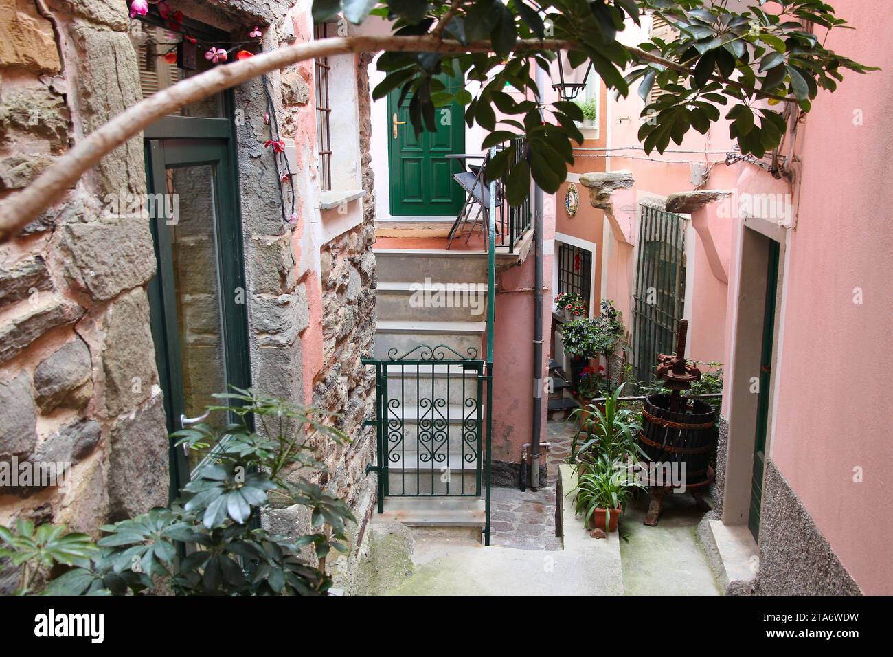 Cinque Terre, Italy - narrow street of quaint colorful medieval old town of Vernazza Stock Photo ...