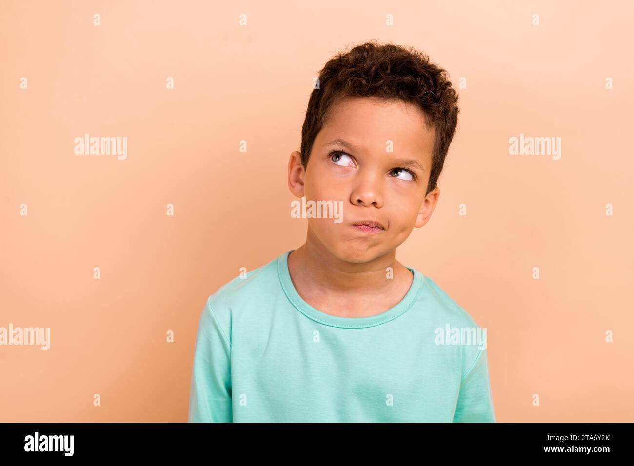 Photo of minded cute boy wear trendy clothes hmm doubt idea plan ...